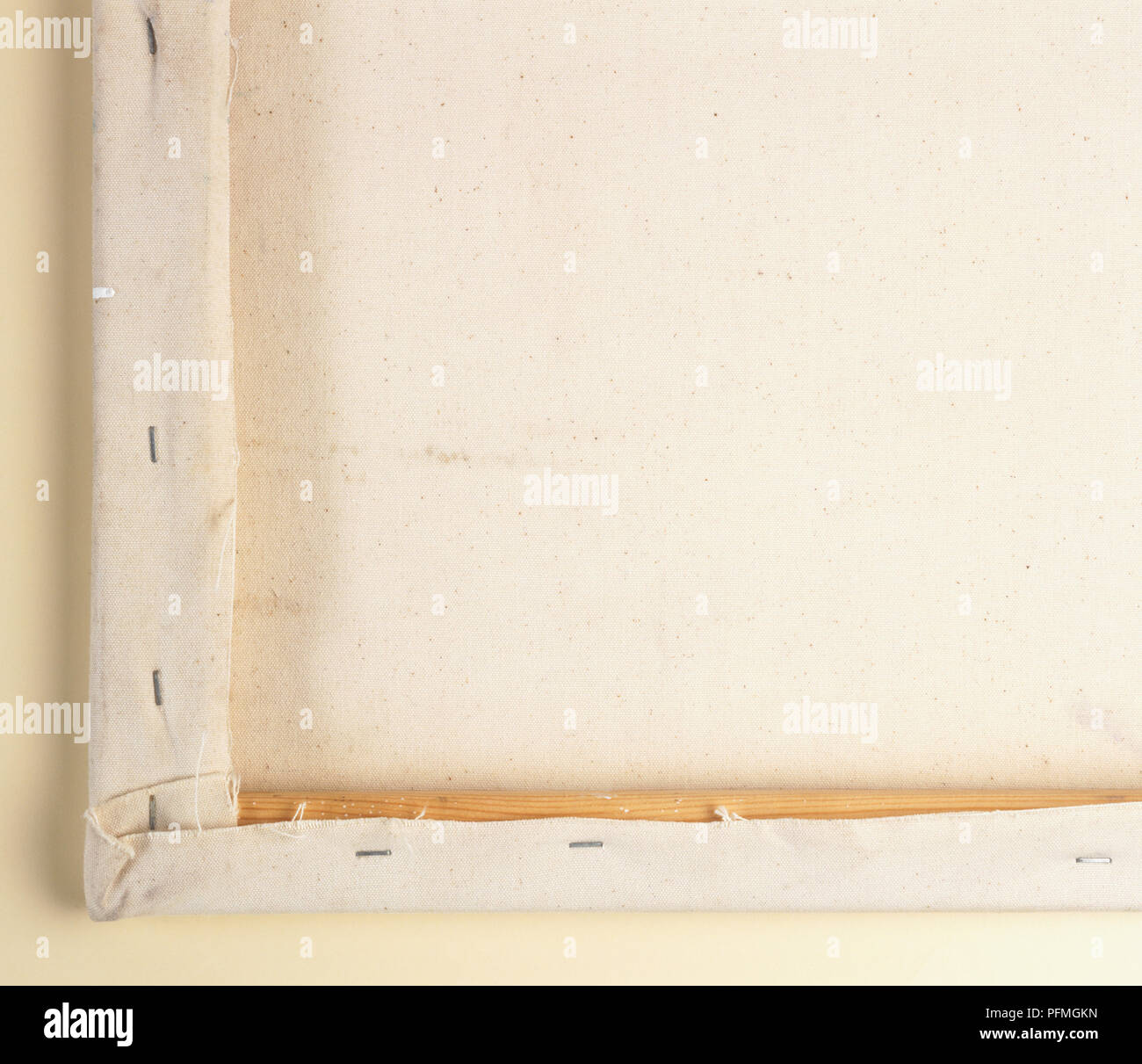 Detail of stretched and stapled white canvas Stock Photo - Alamy