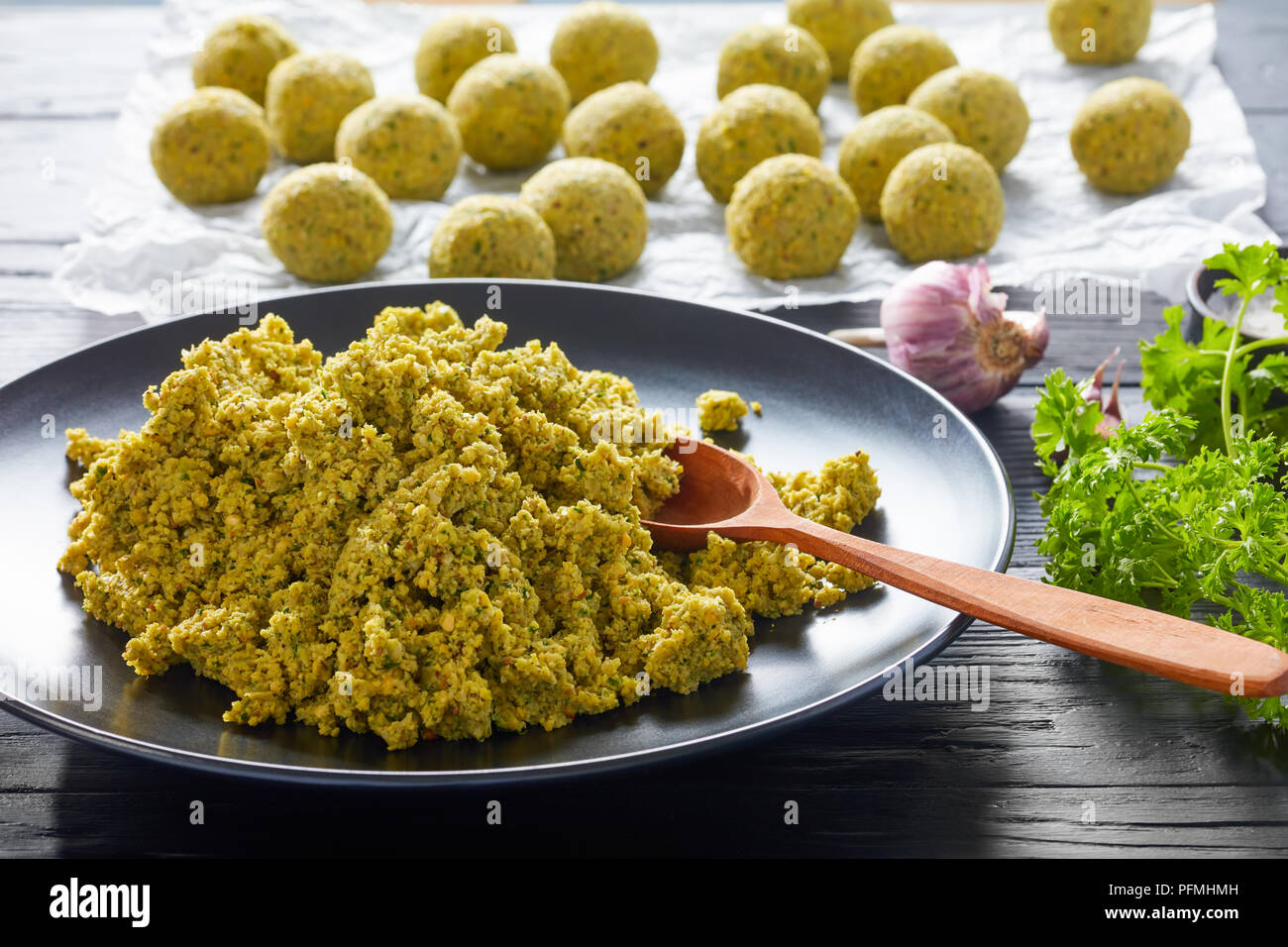 freshly ground chickpea mixed with greens and spices and raw falafel ...