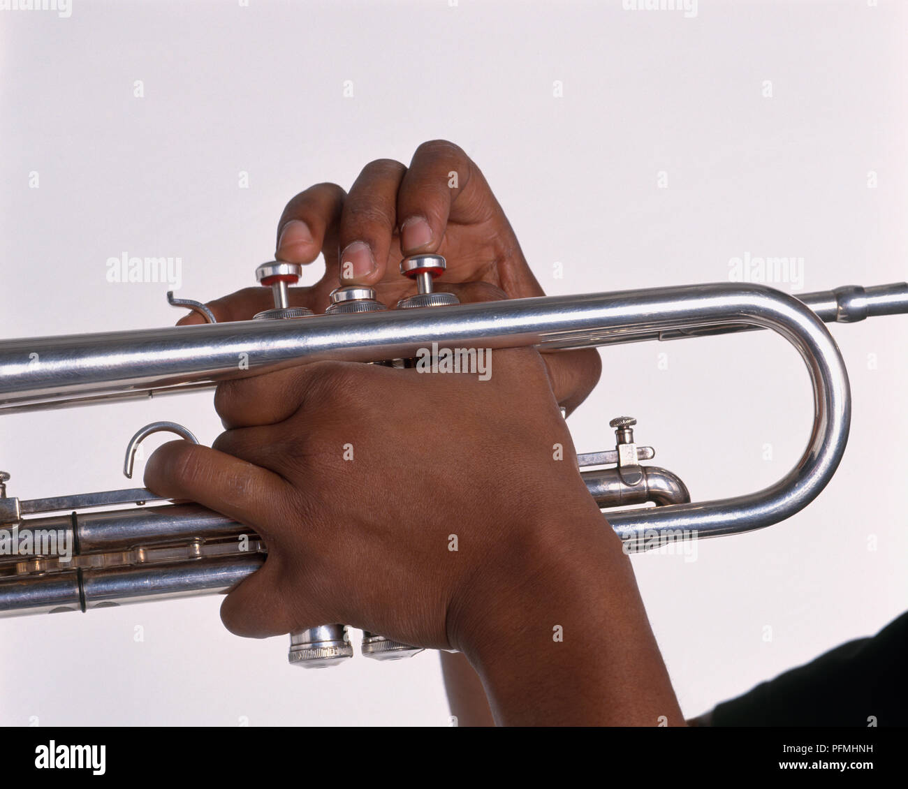 Playing trumpet hand hi-res stock photography and images - Alamy