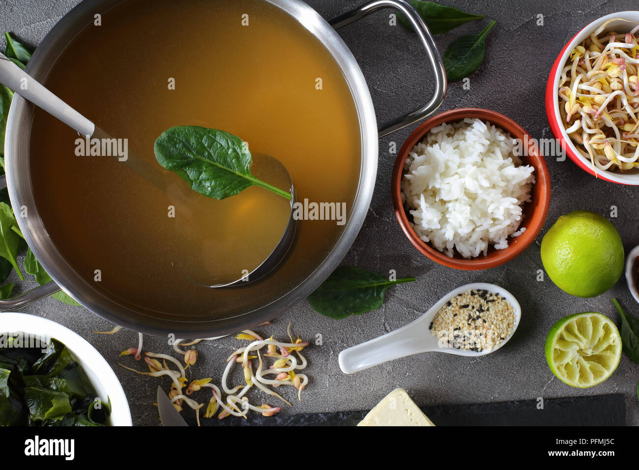 dashi in a stainless pan and ingredients for traditional japanese miso ...