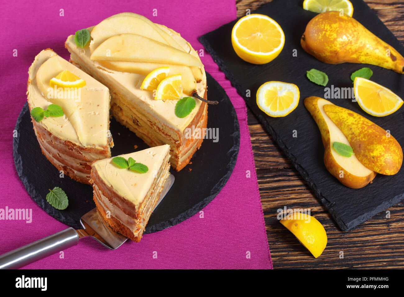 delicious sliced homemade pear sponge cake with cream cheese, decorated ...