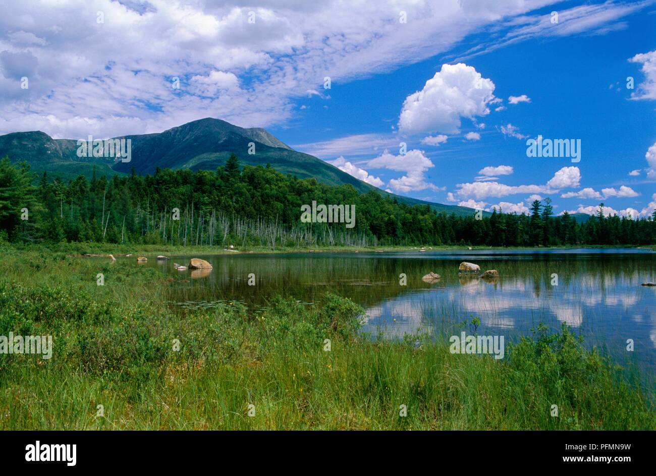 USA, Maine, Baxter State Park, view across the lake at Mount Katahdin ...
