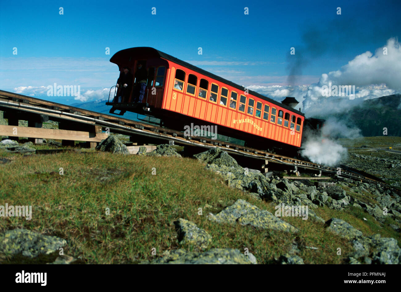 Steam train travelling up the cog track to the top of the Mount ...