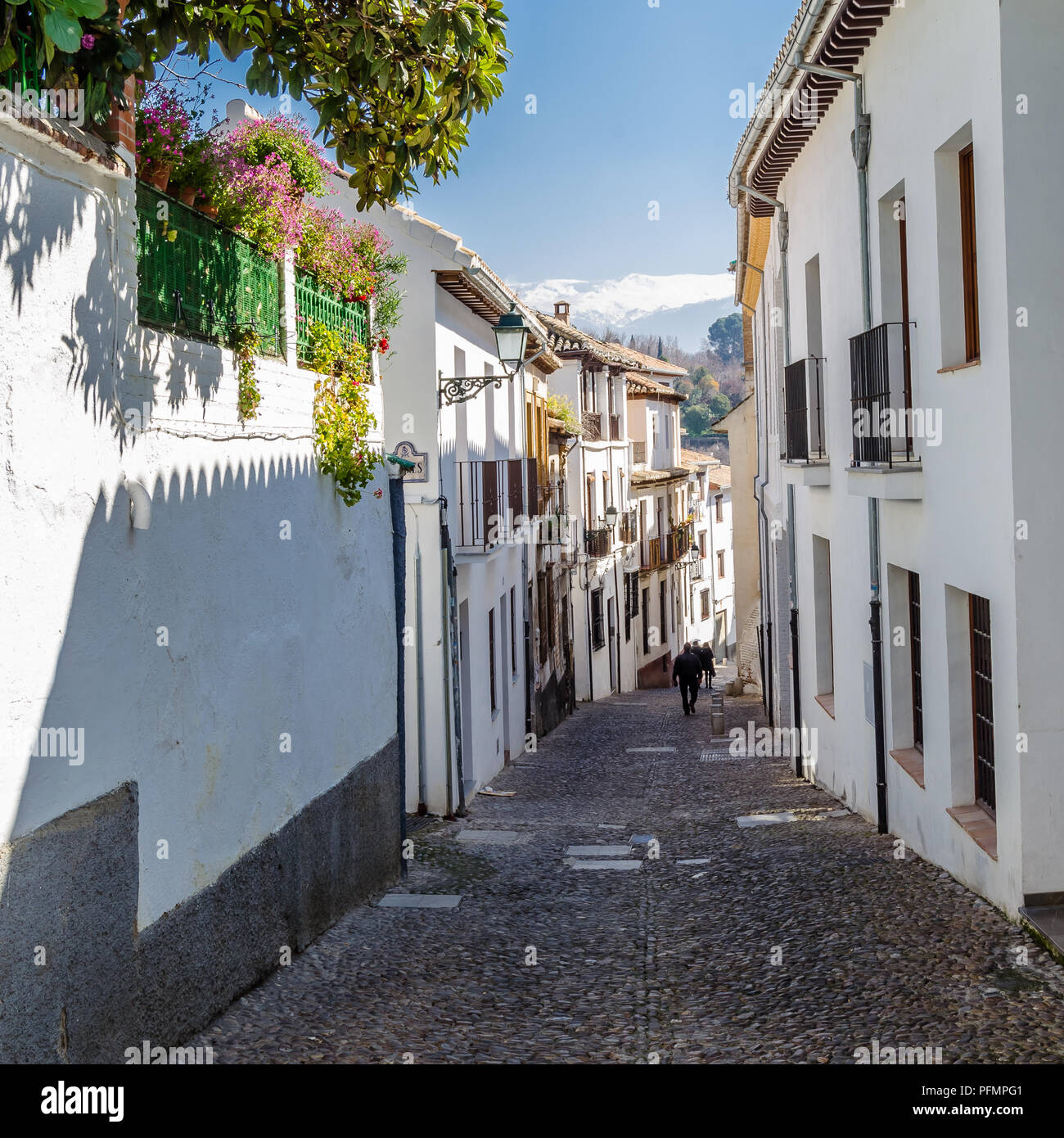 GRANADA, SPAIN - FEBRUARY 22, 2015: Urban scene, view of a street in ...
