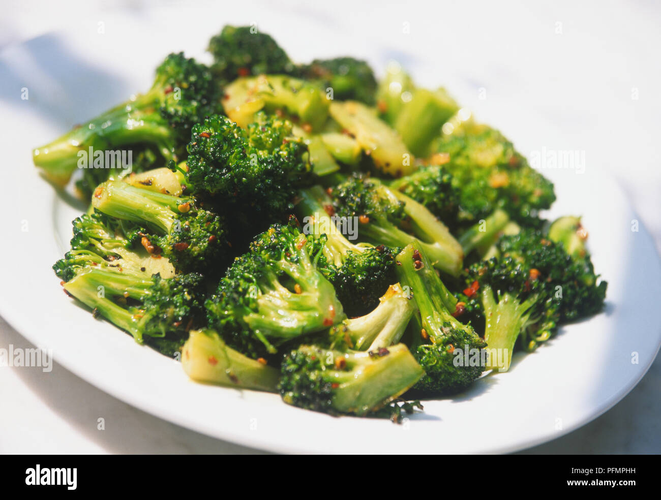Broccoli flavoured with chilli Stock Photo - Alamy
