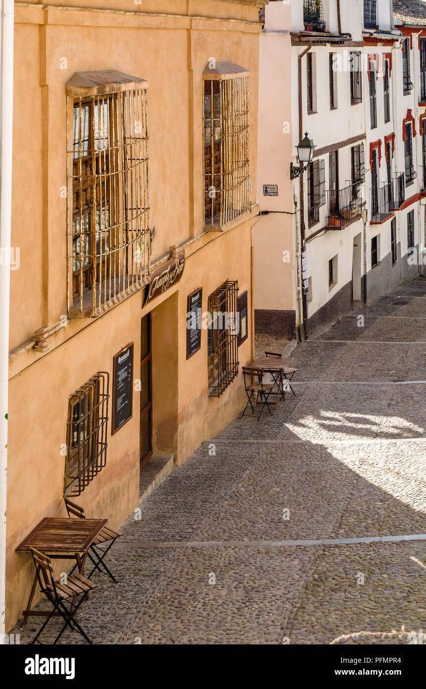 GRANADA, SPAIN - FEBRUARY 22, 2015: Urban scene, view of a street in ...