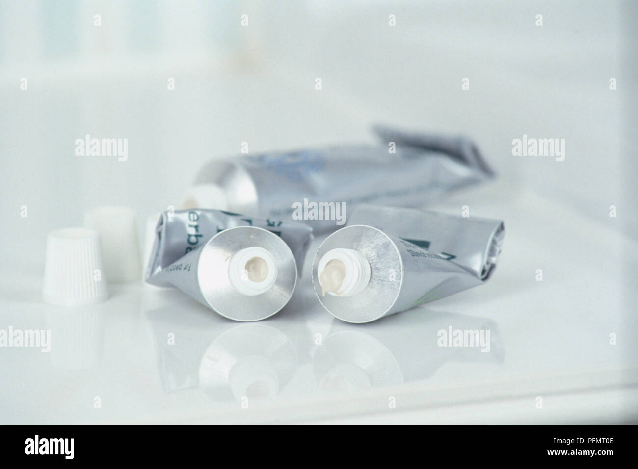Open tubes of organic toothpaste Stock Photo - Alamy