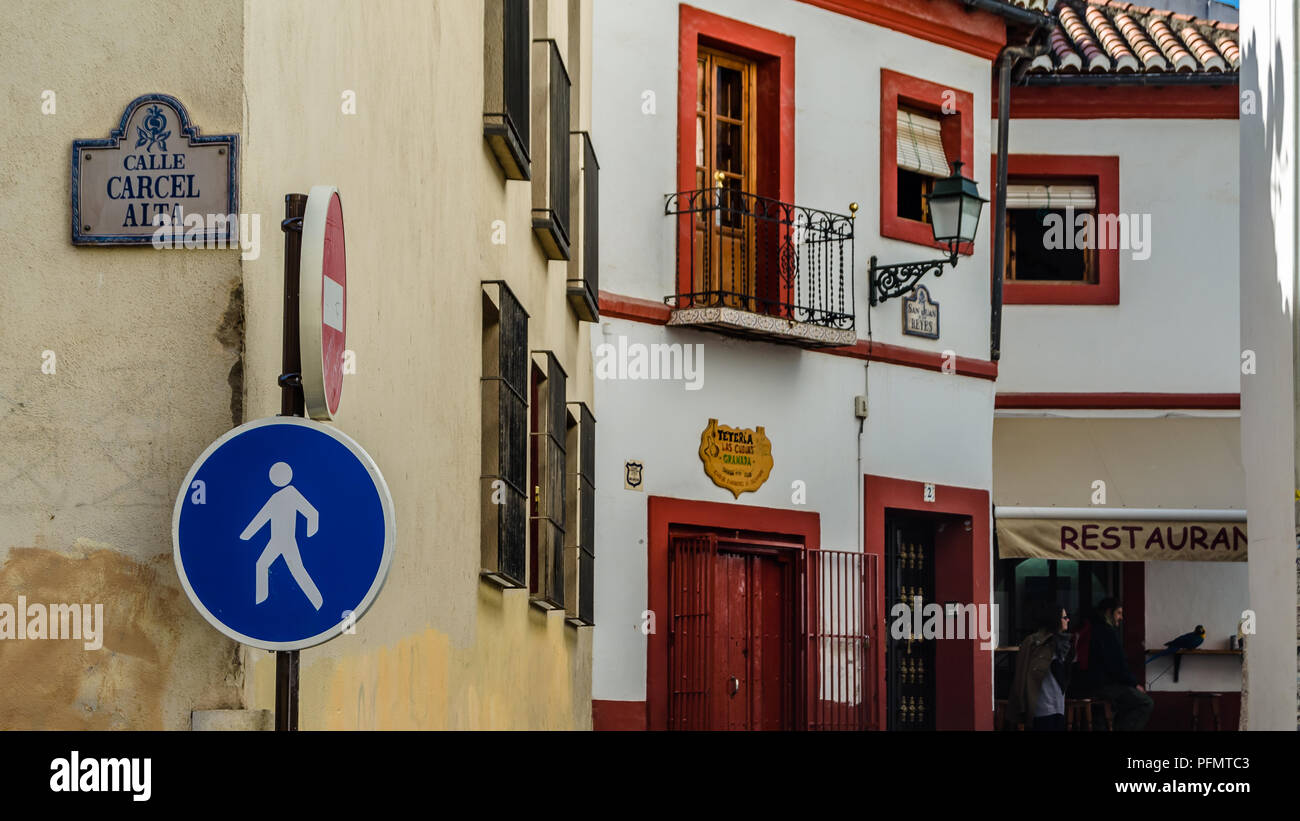 GRANADA, SPAIN - FEBRUARY 22, 2015: Urban scene, view of a street in ...