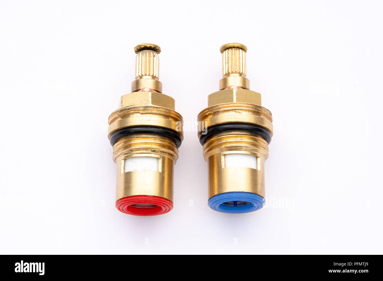 Hot and cold water metal tap glands Stock Photo - Alamy