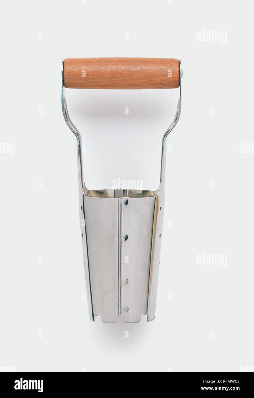 Metal dibber with wooden handle Stock Photo - Alamy