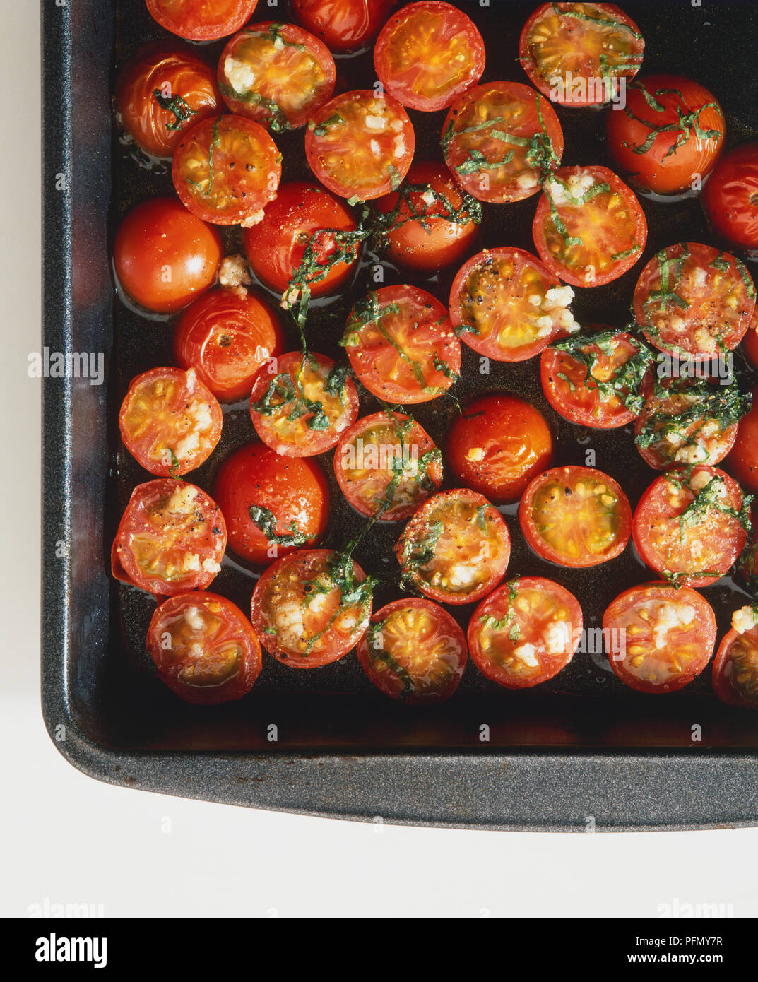 Roasted Cherry Tomato Salsa in Roasting Tin Stock Photo - Alamy