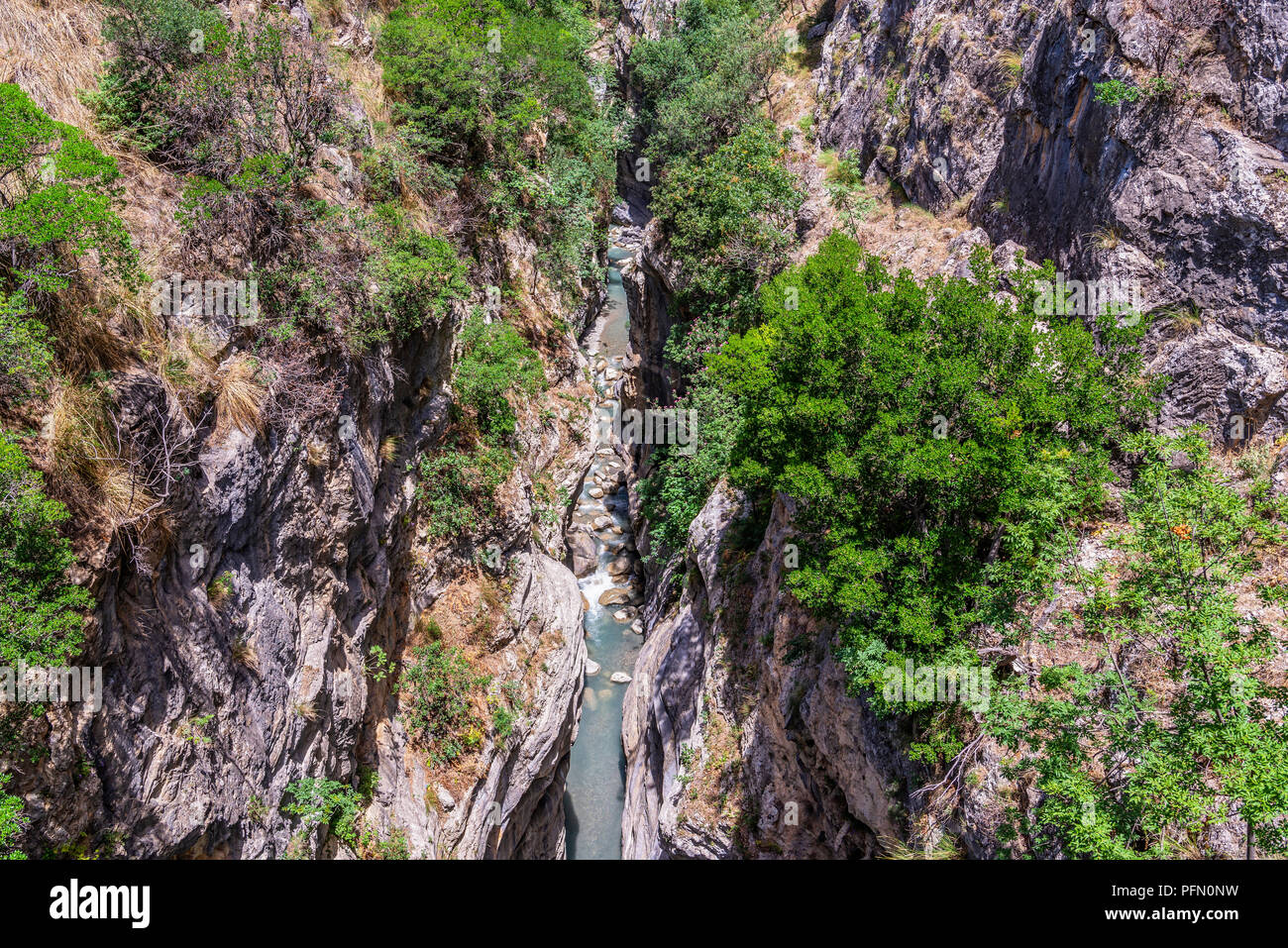 views of il Ponte del diavolo and the Raganello river in Civita inside ...
