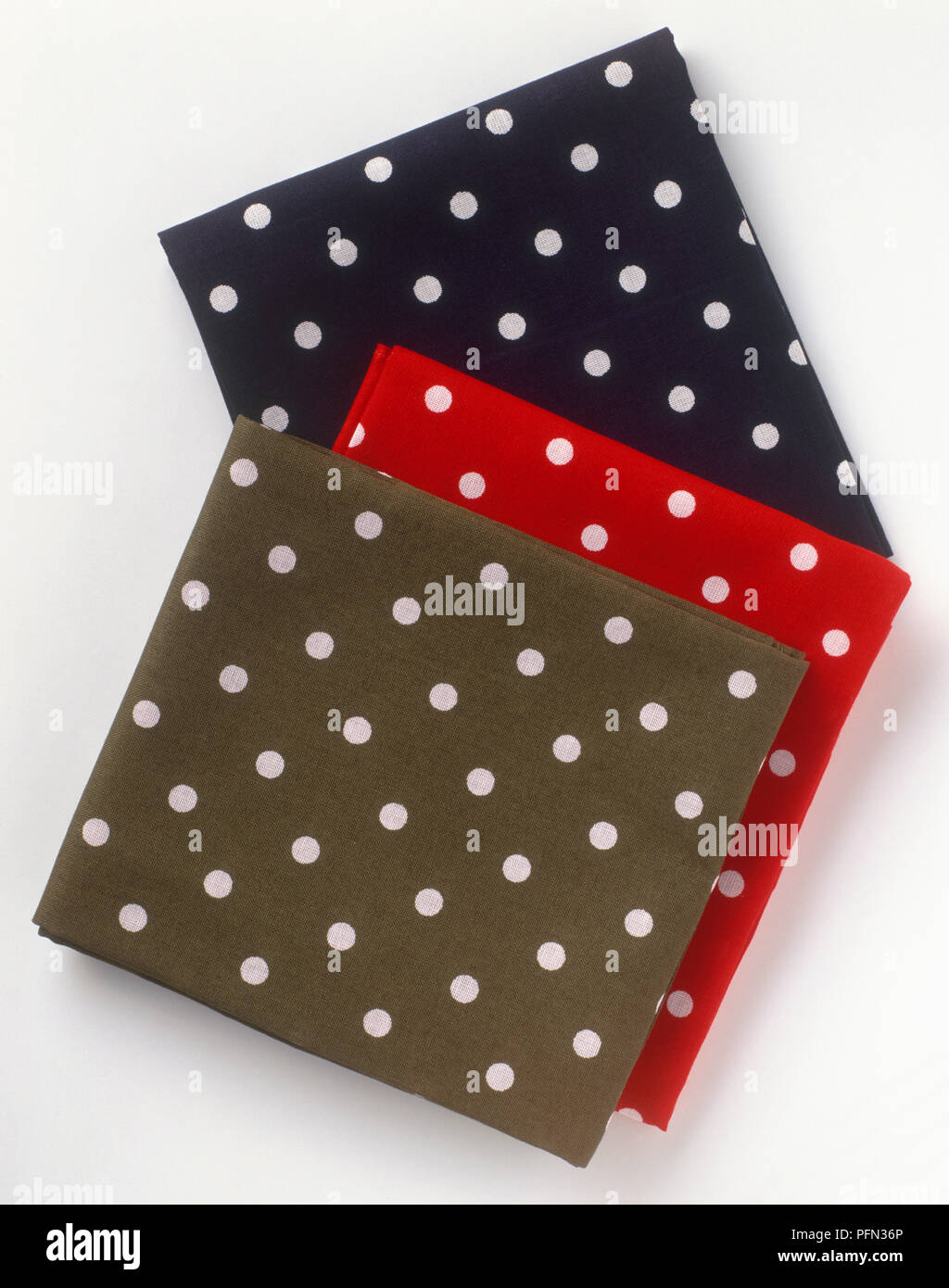 Different coloured, dotted linen pocket handkerchiefs Stock Photo - Alamy