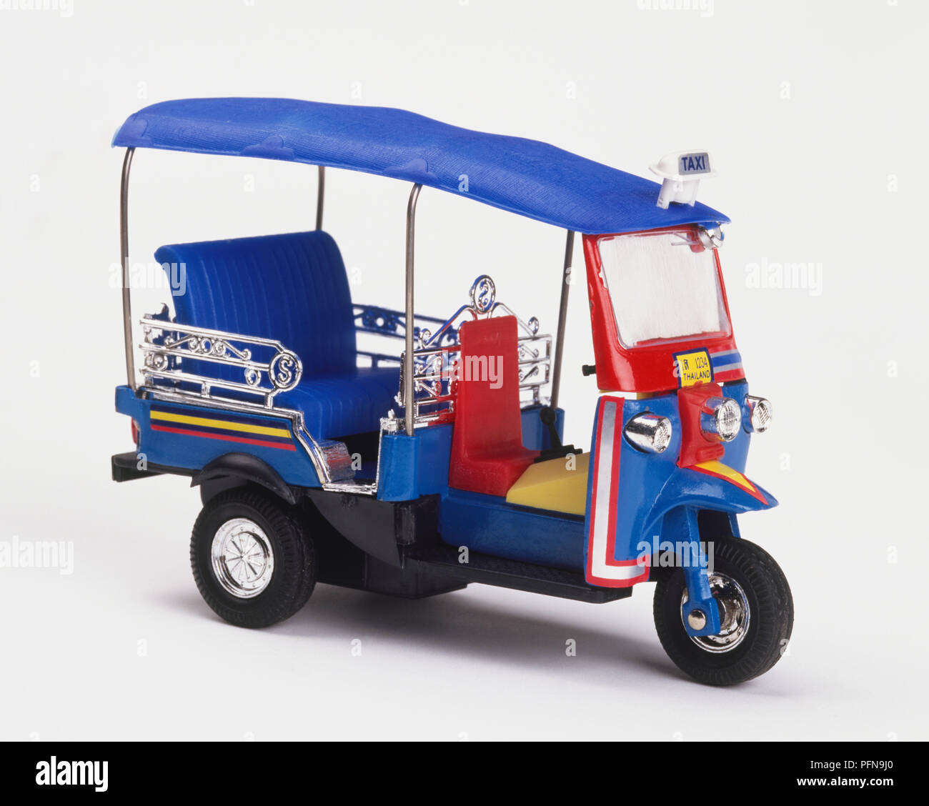 Side view of a toy tuk-tuk Stock Photo - Alamy