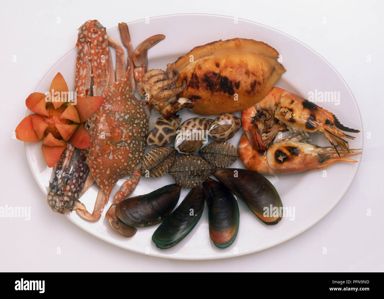 Thai seafood platter including crab, mussels and prawns, with flower ...