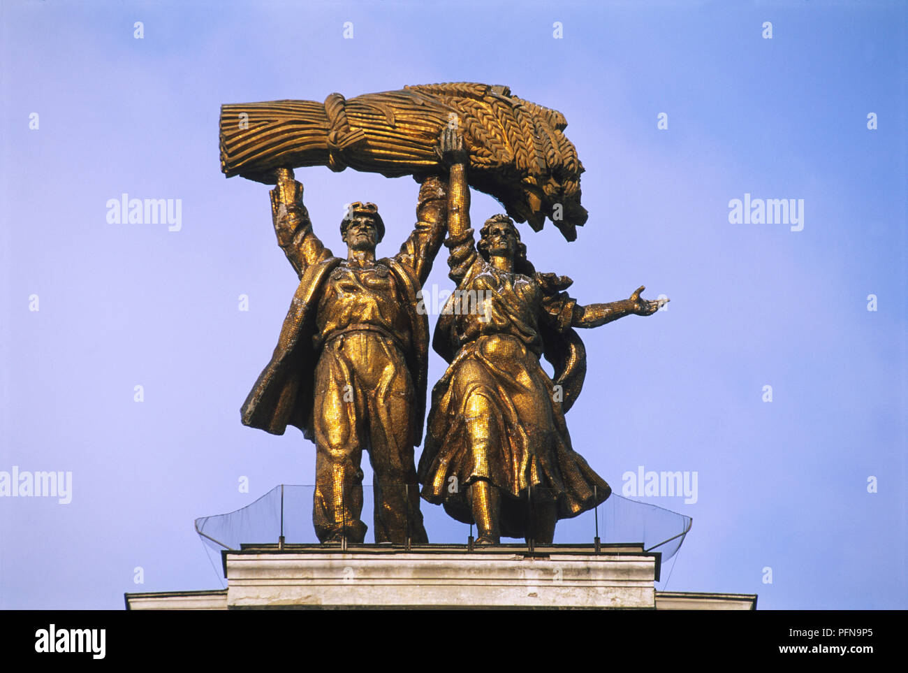 Socialist realist sculpture of Soviet farm workers at the all Russian ...