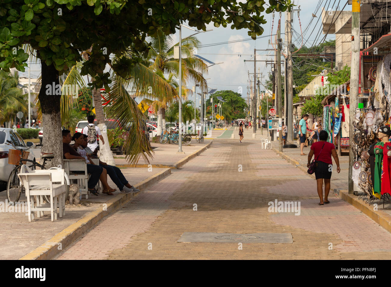 Tulum, Mexico - 7 August 2018: People walking on the sidewalk on ...
