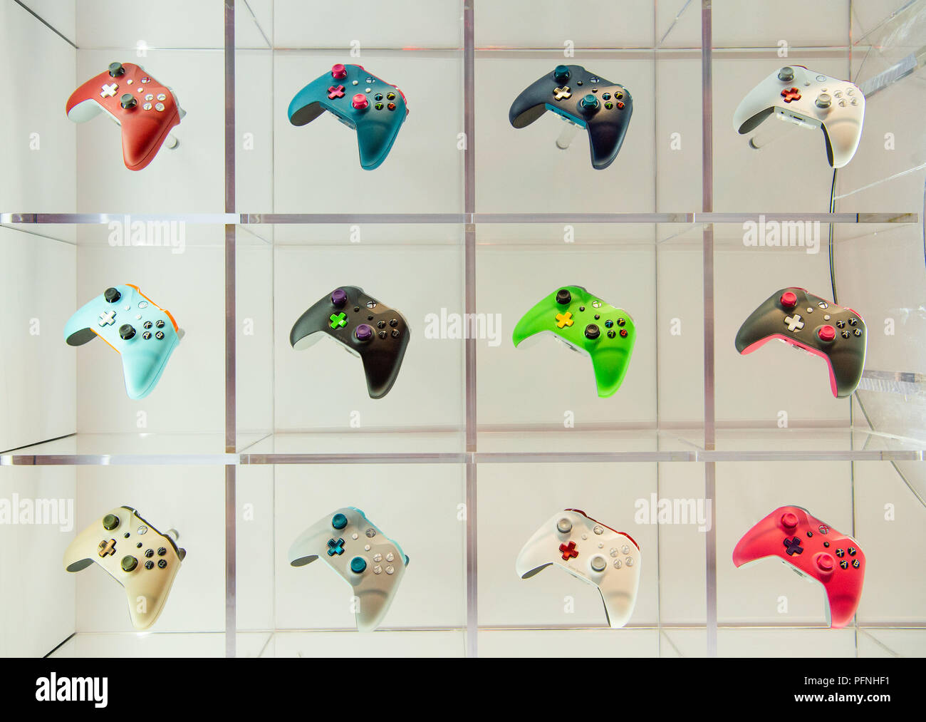 Cologne, Germany. 22nd Aug, 2018. Colourful X-Box controllers are on ...