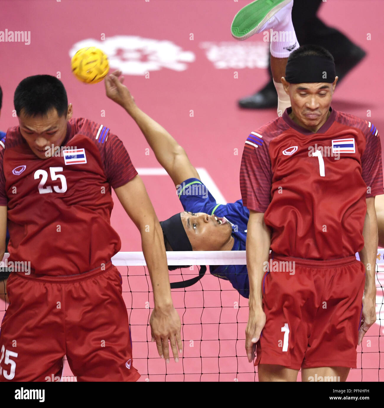 Palembang. 22nd Aug, 2018. Muhamad Norhaffizi Abd Razak (C) of Malaysia ...