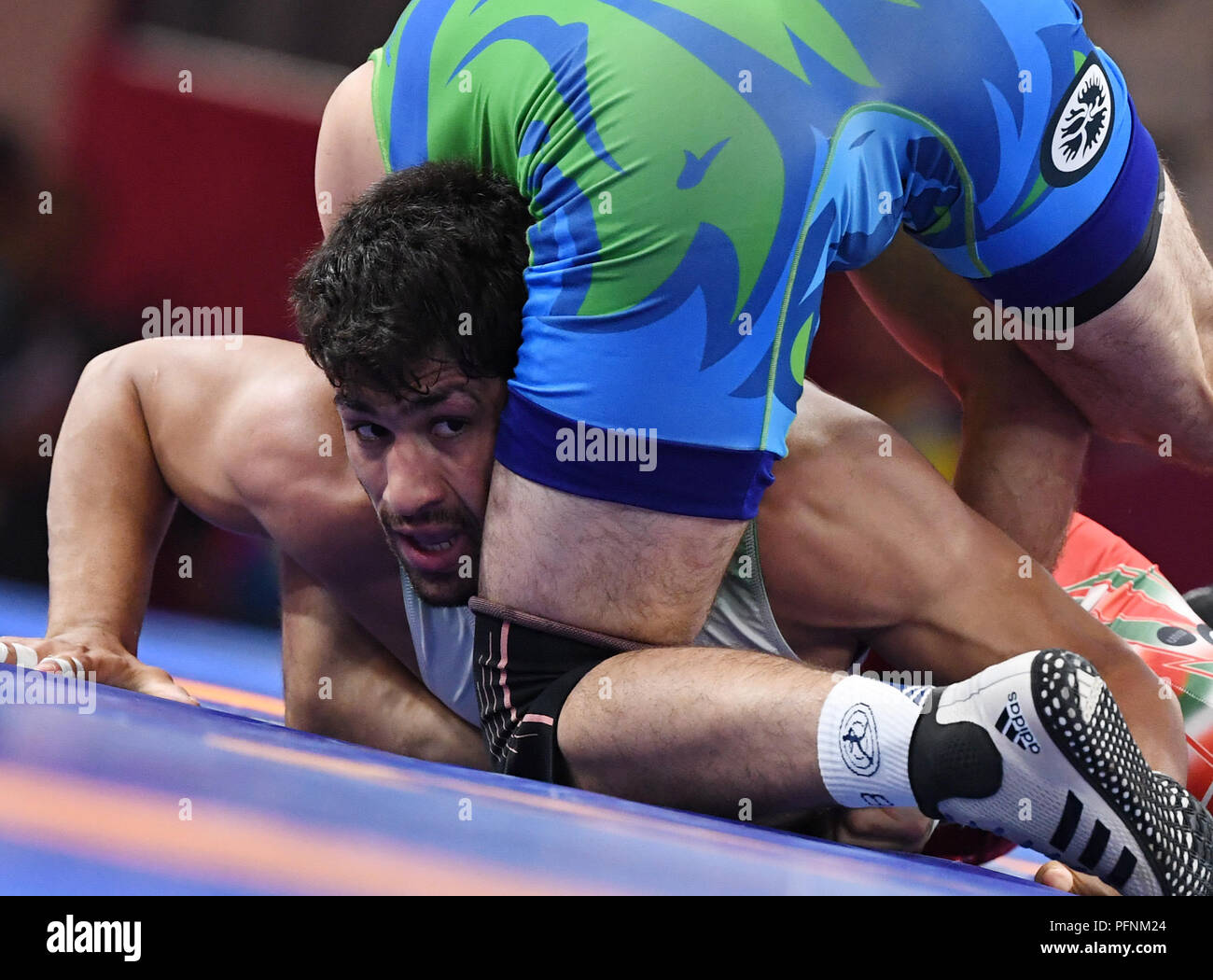 Jakarta, Indonesia. 22nd Aug, 2018. Hossein Nouri(Bottom) of Iran ...