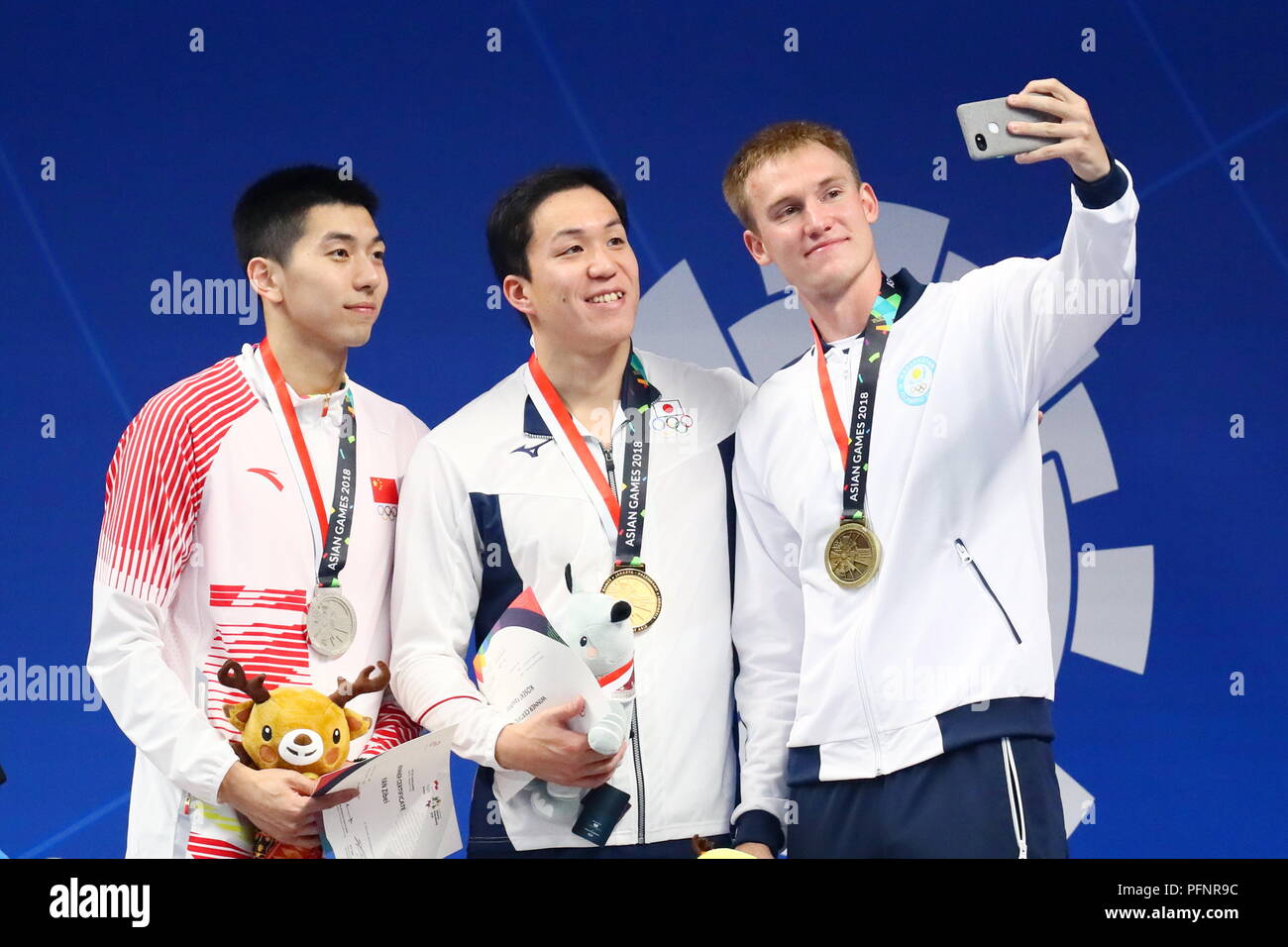 Jakarta, Indonesia. 22nd Aug, 2018. (L-R) Yan Zibei (CHN), Yasuhiro ...