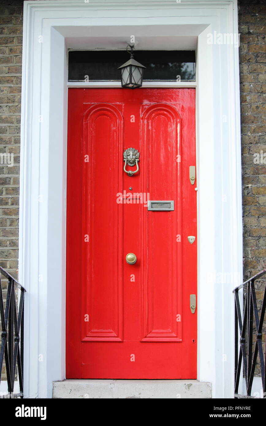Colourful british style squared front door Stock Photo - Alamy