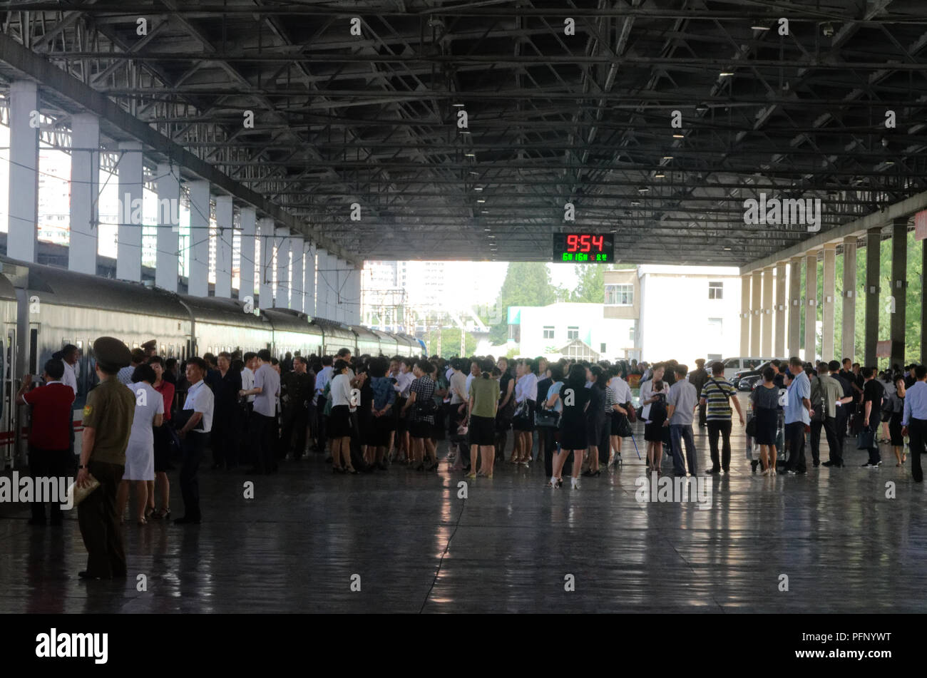 Crowds of tourists on the platform at Pyongyang railway station ...