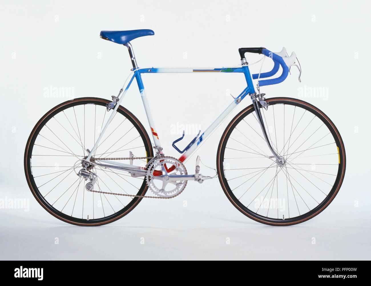 Blue and white racing bike, side view Stock Photo - Alamy