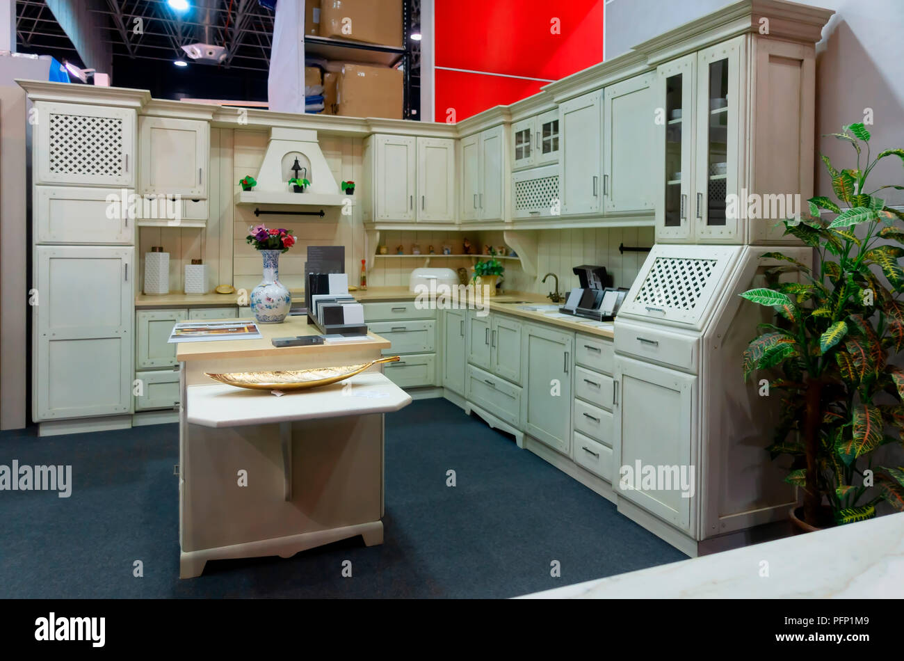 A modern kitchen with white wooden furniture in an exhibition Stock ...