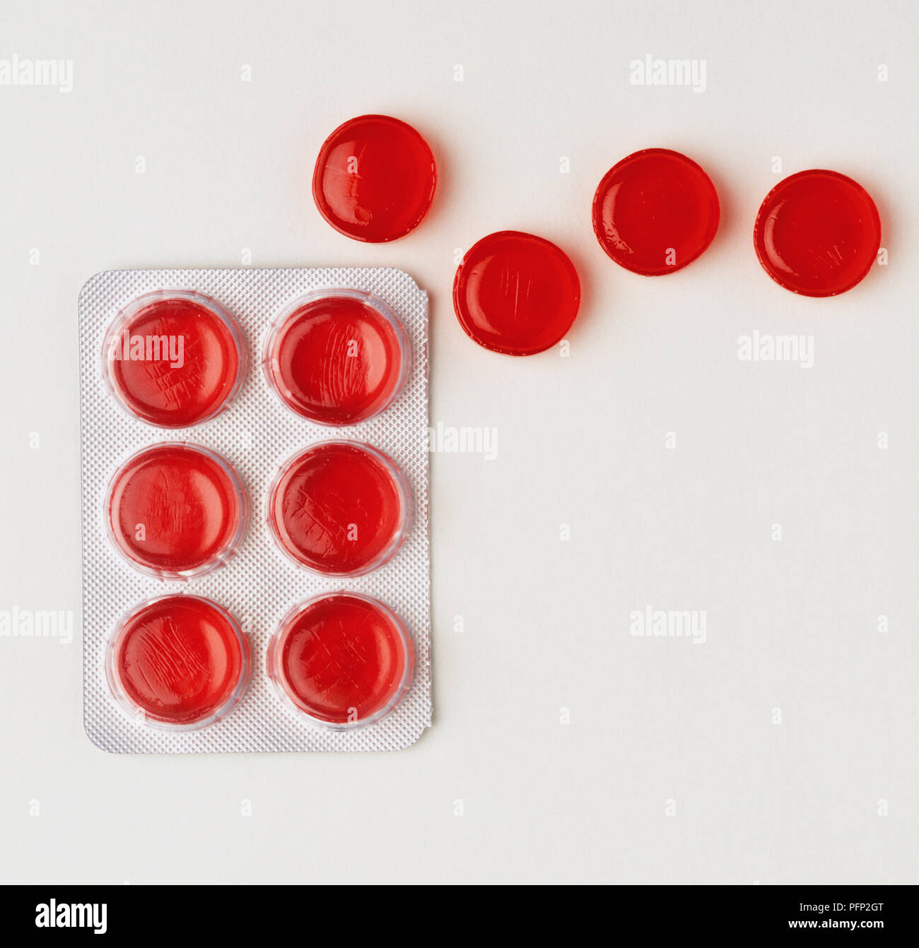 Some red antiseptic throat lozenges Stock Photo - Alamy