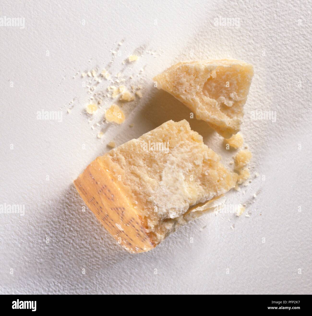 Broken Parmesan cheese Stock Photo - Alamy