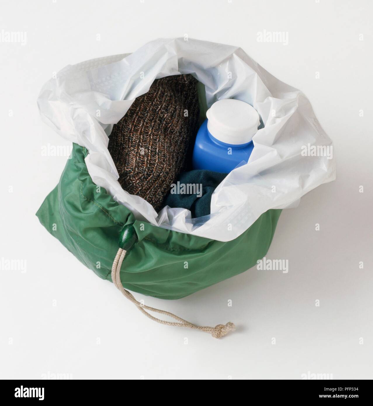 Items in a backpack with cord lock Stock Photo - Alamy