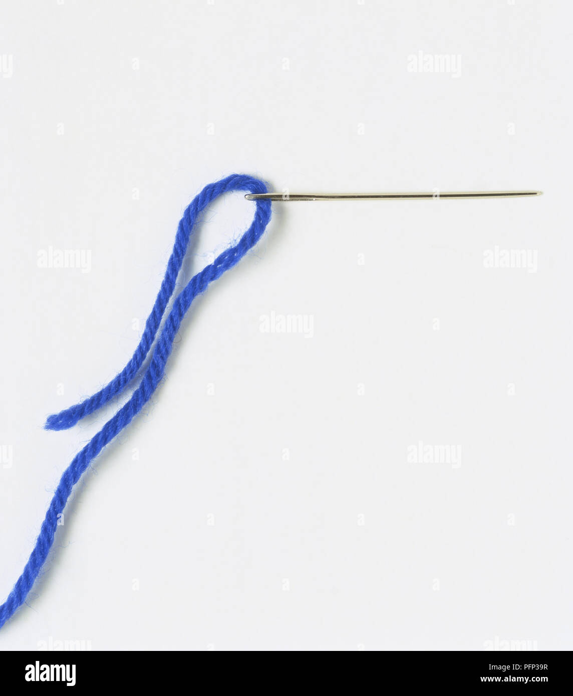 Threaded needles hi-res stock photography and images - Alamy