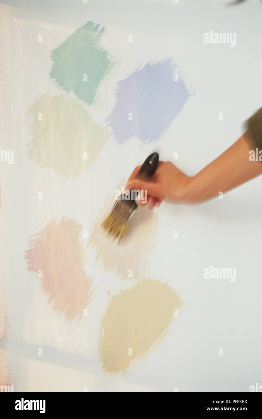 Using paintbrush to display different colored organic water-based ...