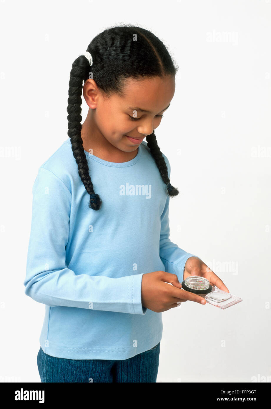 Orienteering compass girl hi-res stock photography and images - Alamy