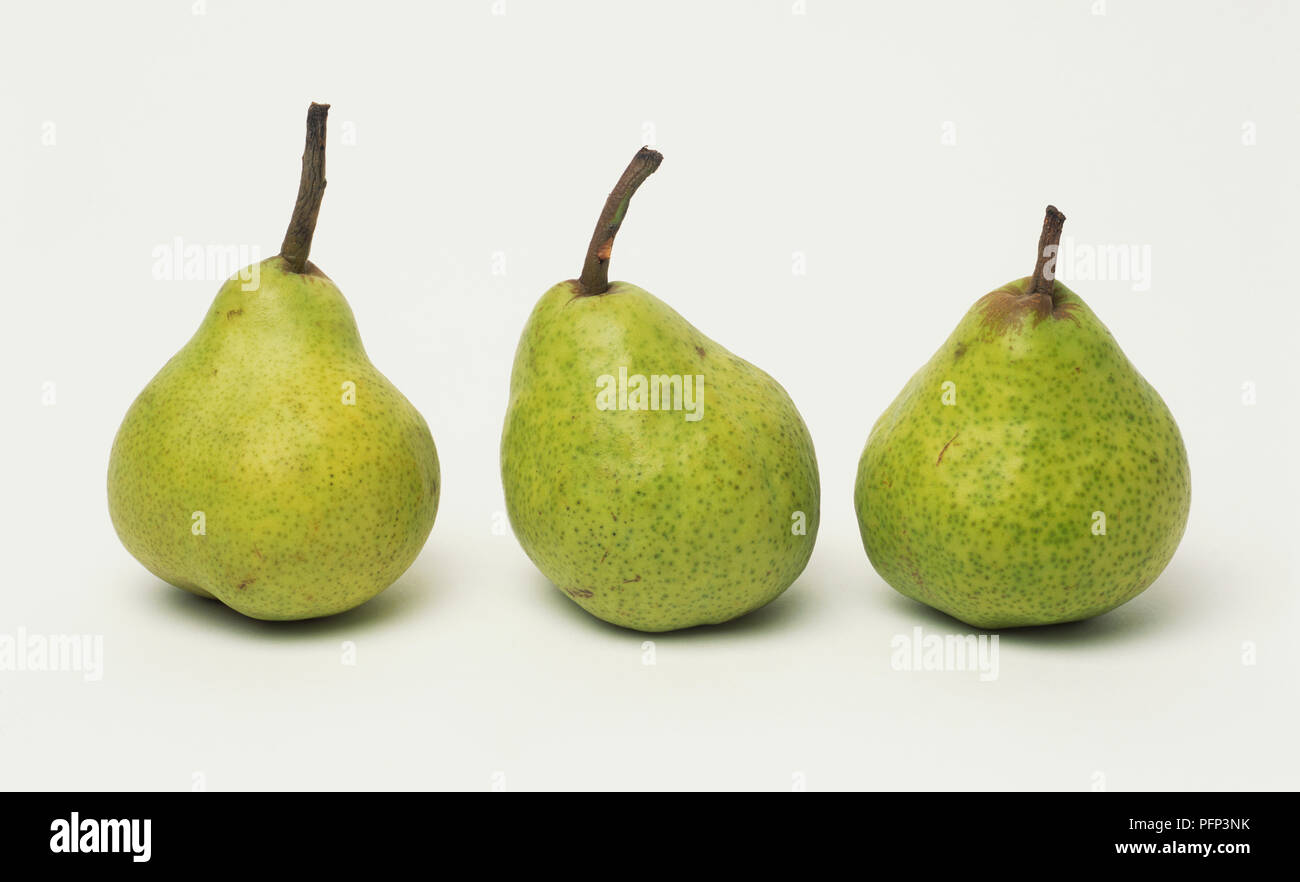 Three green Pears Stock Photo - Alamy