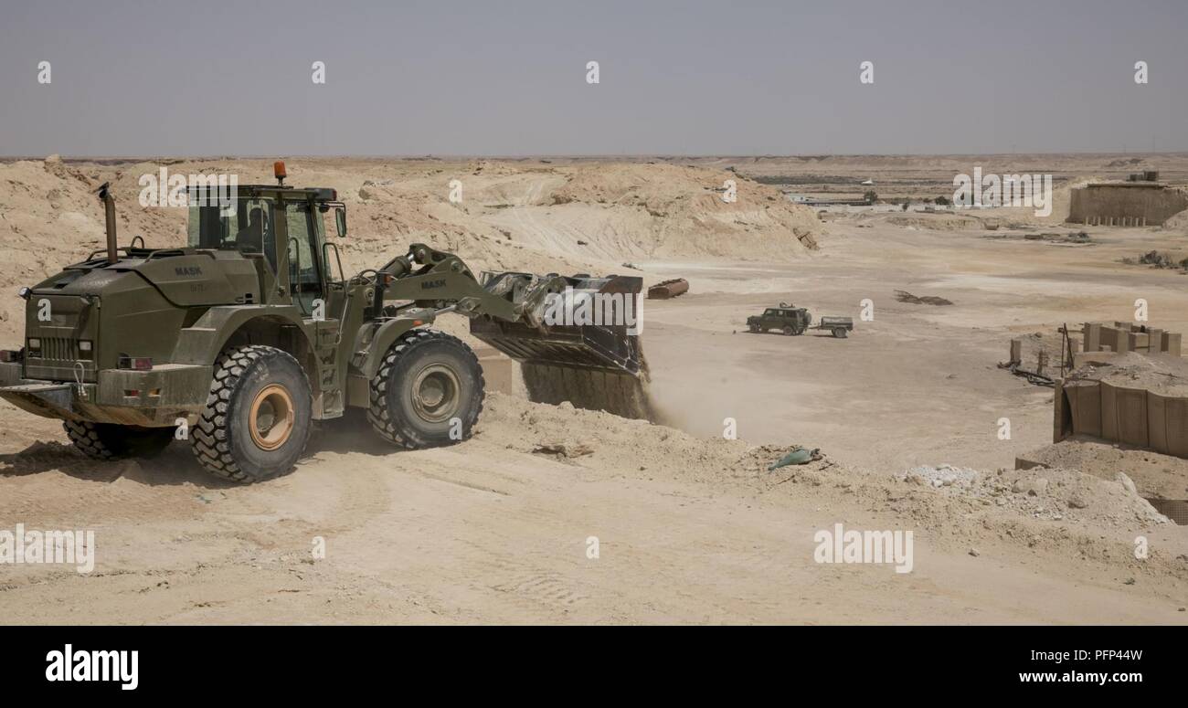 Danish soldiers construct defensive trenches for a future Iraqi Border ...