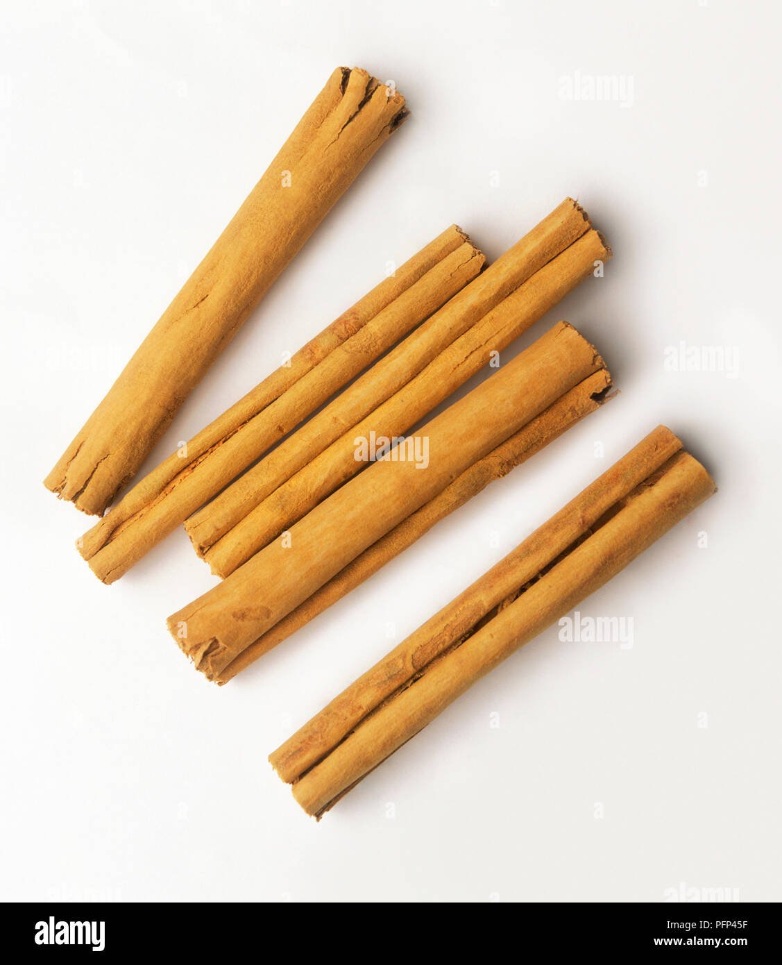 Five dried cinnamon sticks Stock Photo - Alamy
