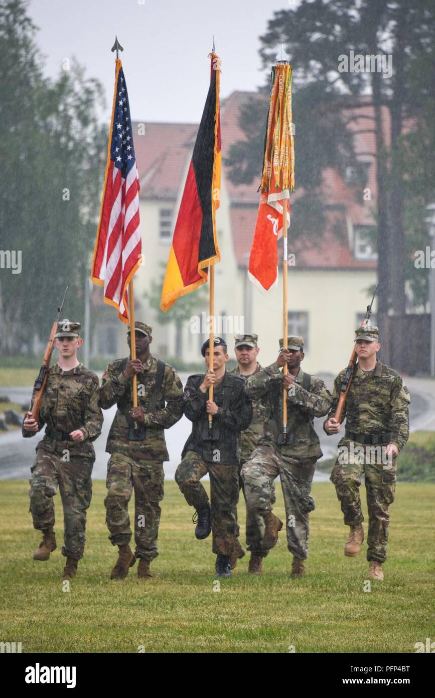 The ceremonial color guard advances to the front of the formation ...