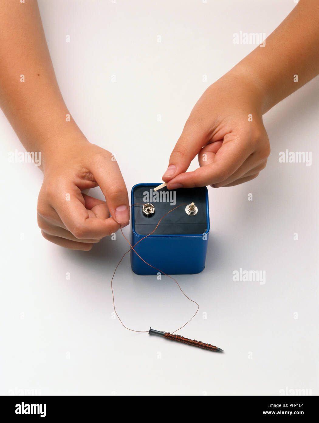 Changing copper wires on battery so electric current flows the opposite ...