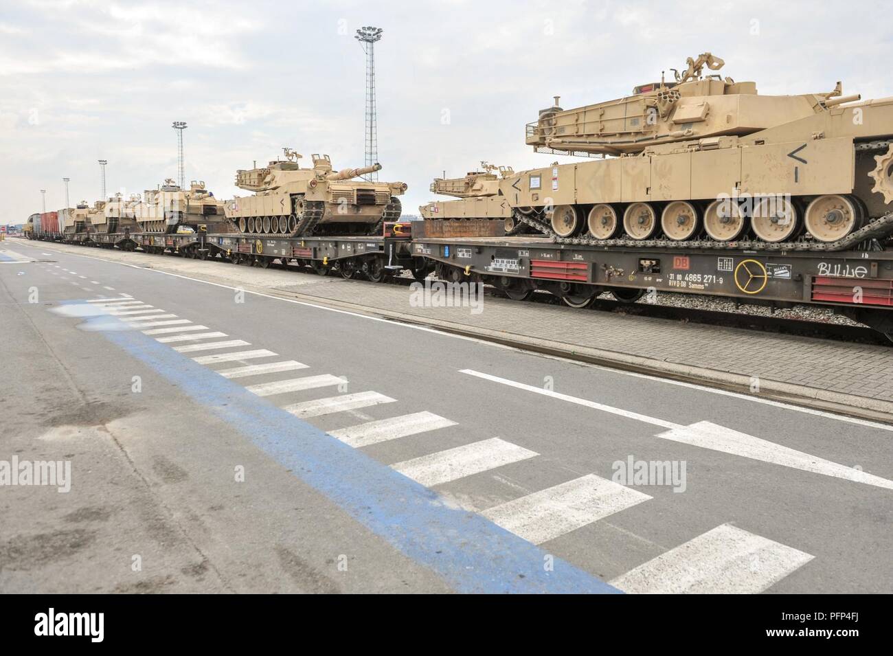 A train carrying M1 Abrams Tanks and other equipment from 1st Armored ...