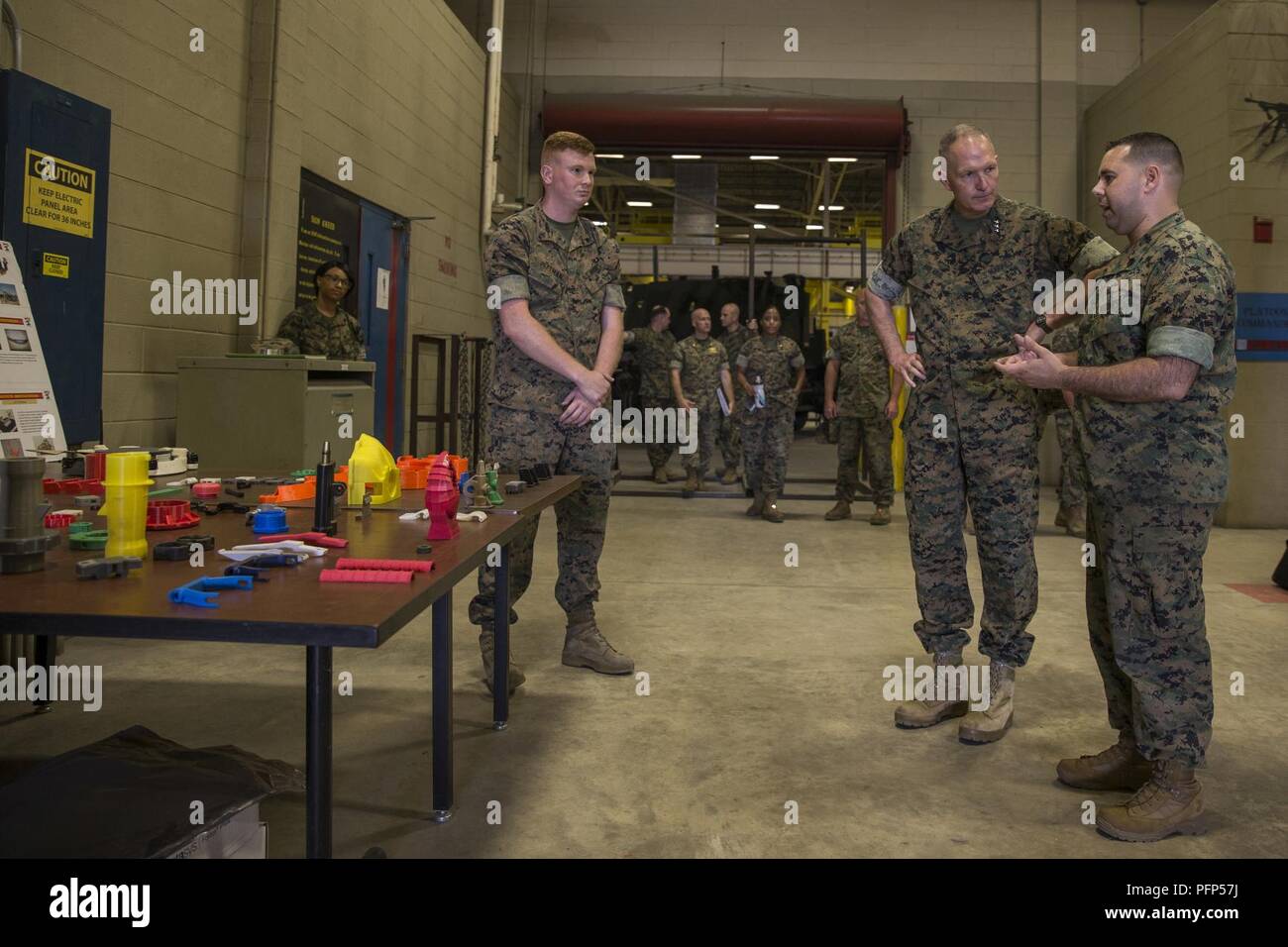 U.S. Marine Corps Staff Sgt. Kenan Johnson, right, 2nd Maintenance ...