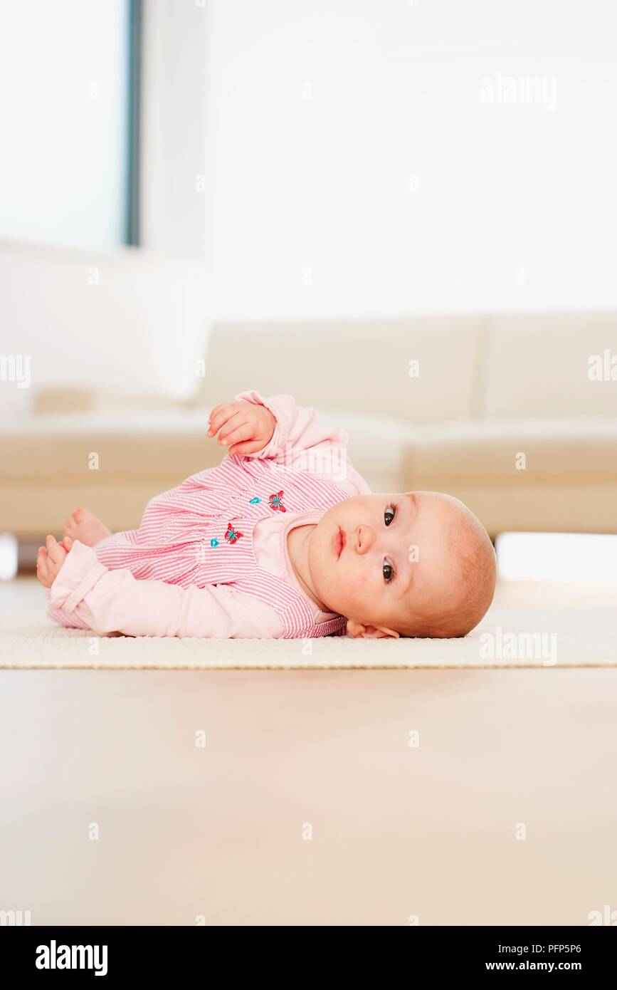 Girl rolling floor hi-res stock photography and images - Alamy