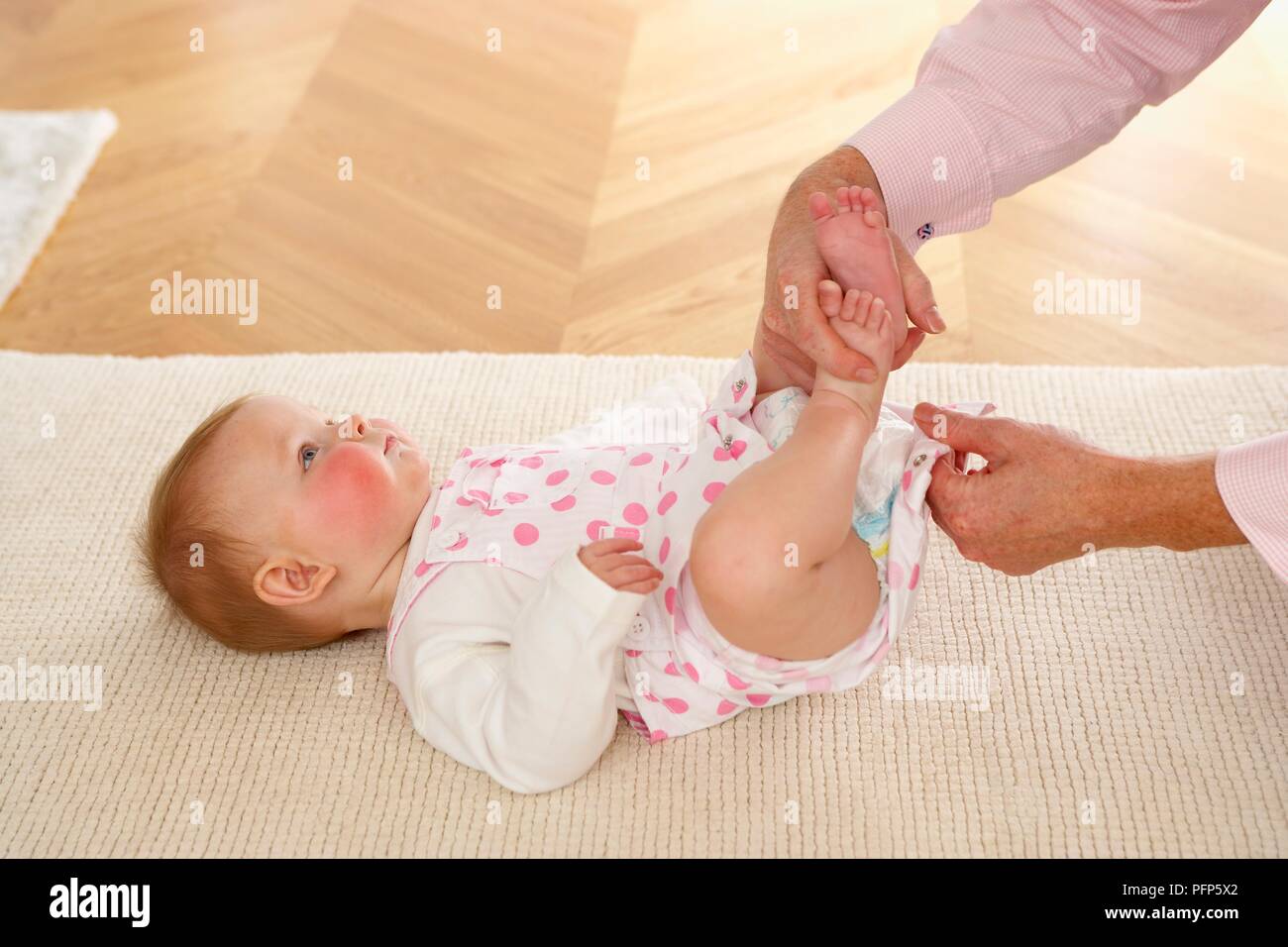 Man changing nappy hi-res stock photography and images - Alamy