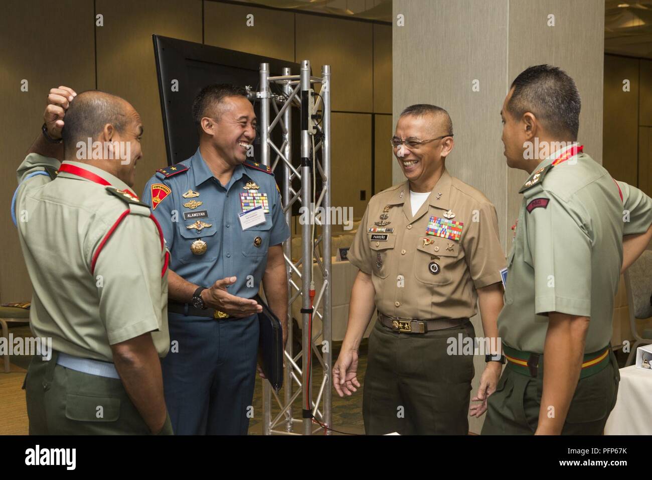 Malaysian Col. Loc Hamaca Hj Nawi, left, commanding officer, 21st CDO ...
