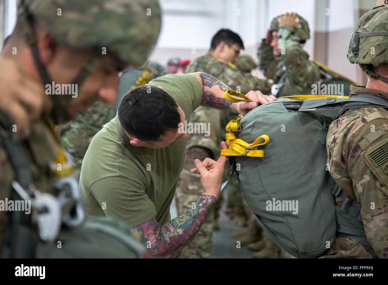 A U.S. Army Jump master assigned to the 82nd Airborne Division conducts ...