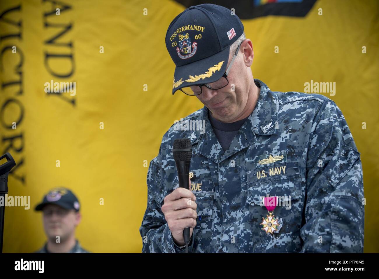 MEDITERRANEAN SEA (May 22, 2018) - Capt. Derek Trinque speaks to guests ...