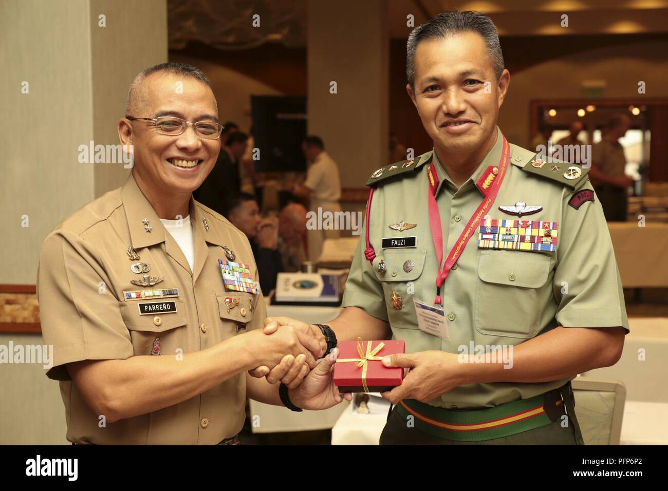 Philippine Marine Corps Maj. Gen. Alvin Parreño, left, commandant of ...