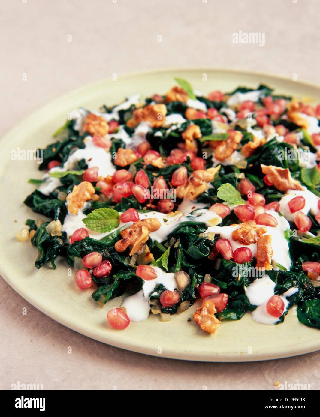 Syrian spinach, walnut and pomegranate salad with yoghurt and mint ...