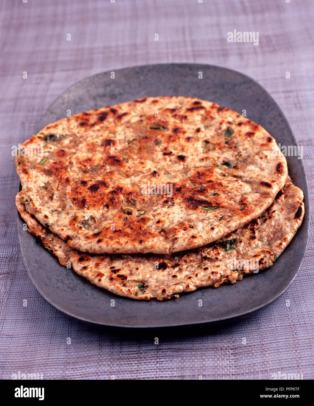 Tawa Mooli Paratha, spicy Indian paratha flatbread stuffed with daikon ...